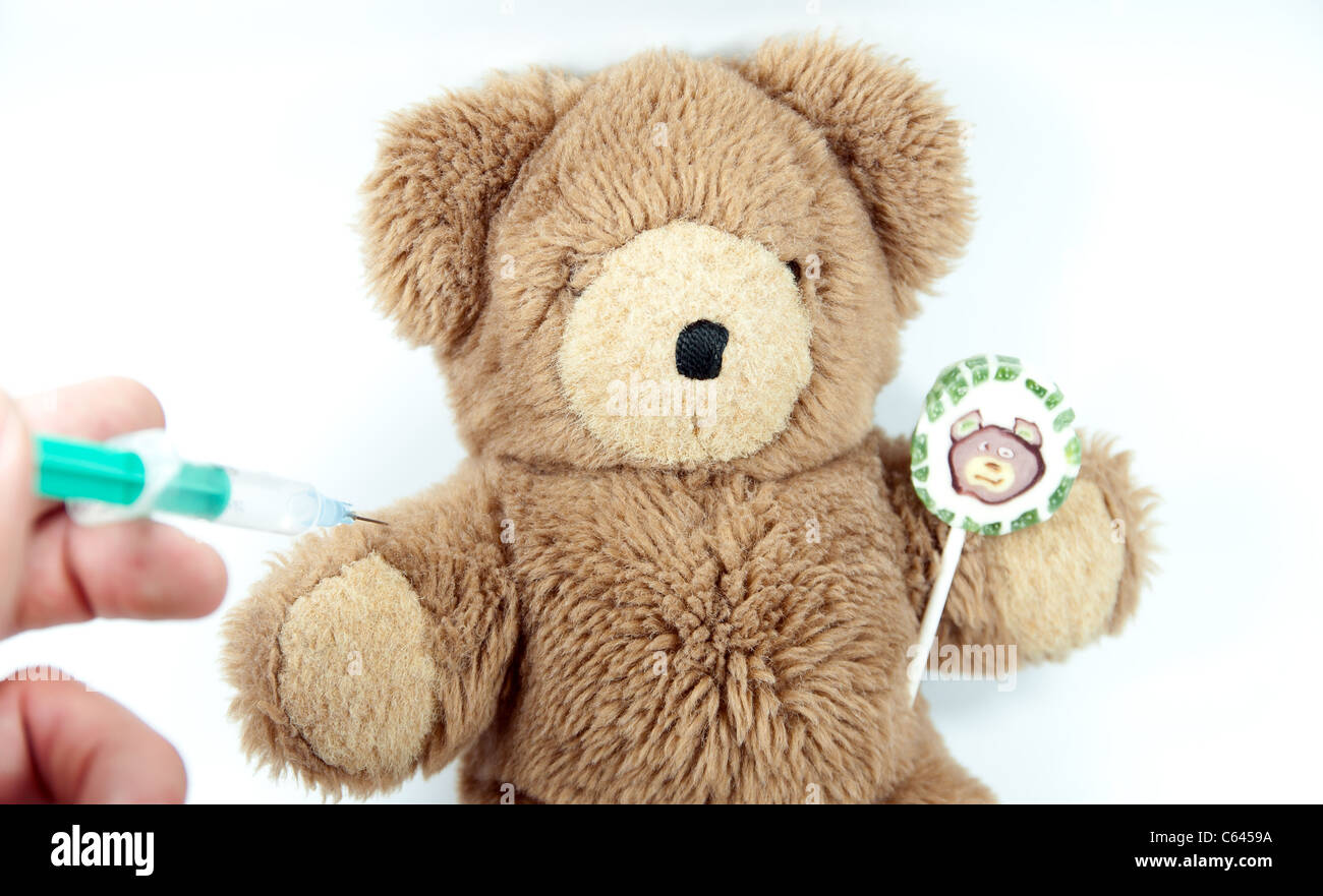 teddy getting a vaccination injection Stock Photo - Alamy