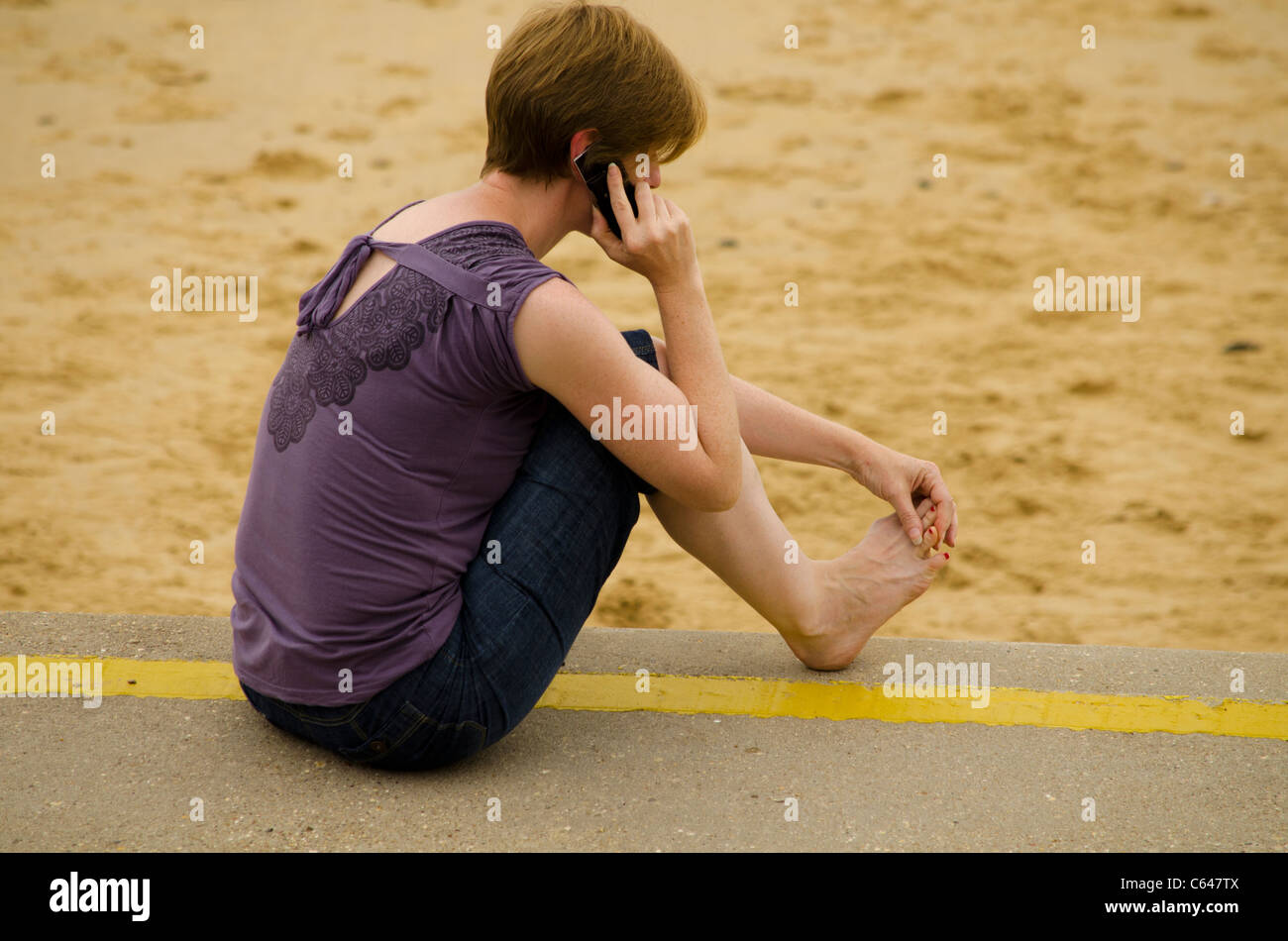 Woman talking on telephone feet hi-res stock photography and images - Alamy
