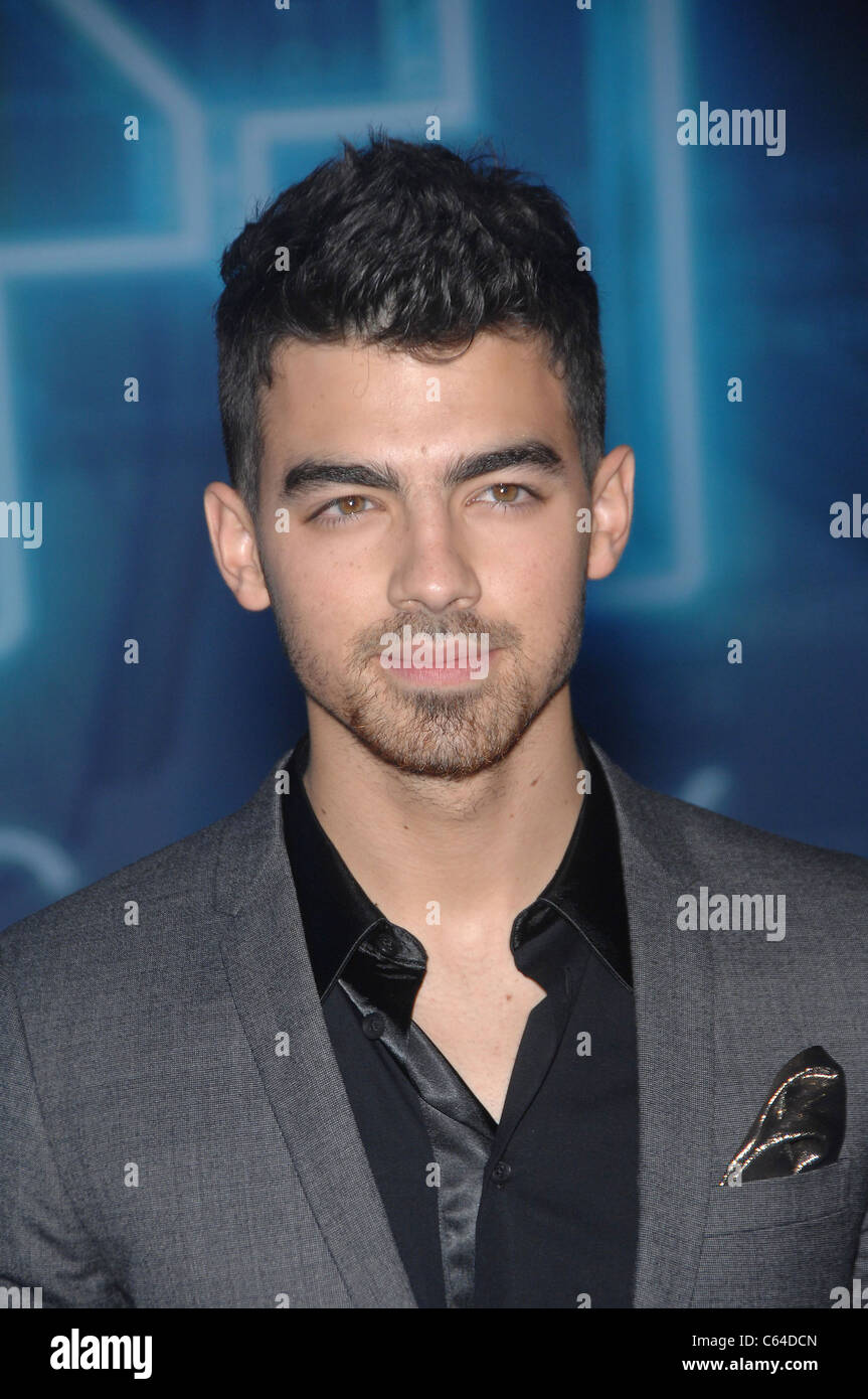 Joe Jonas at arrivals for TRON: LEGACY Premiere, El Capitan Theatre ...