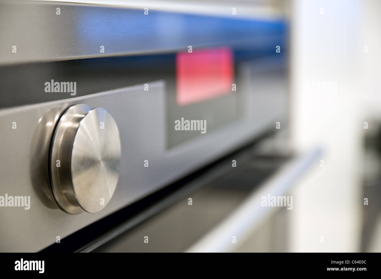modern kitchen stove front panel Stock Photo - Alamy