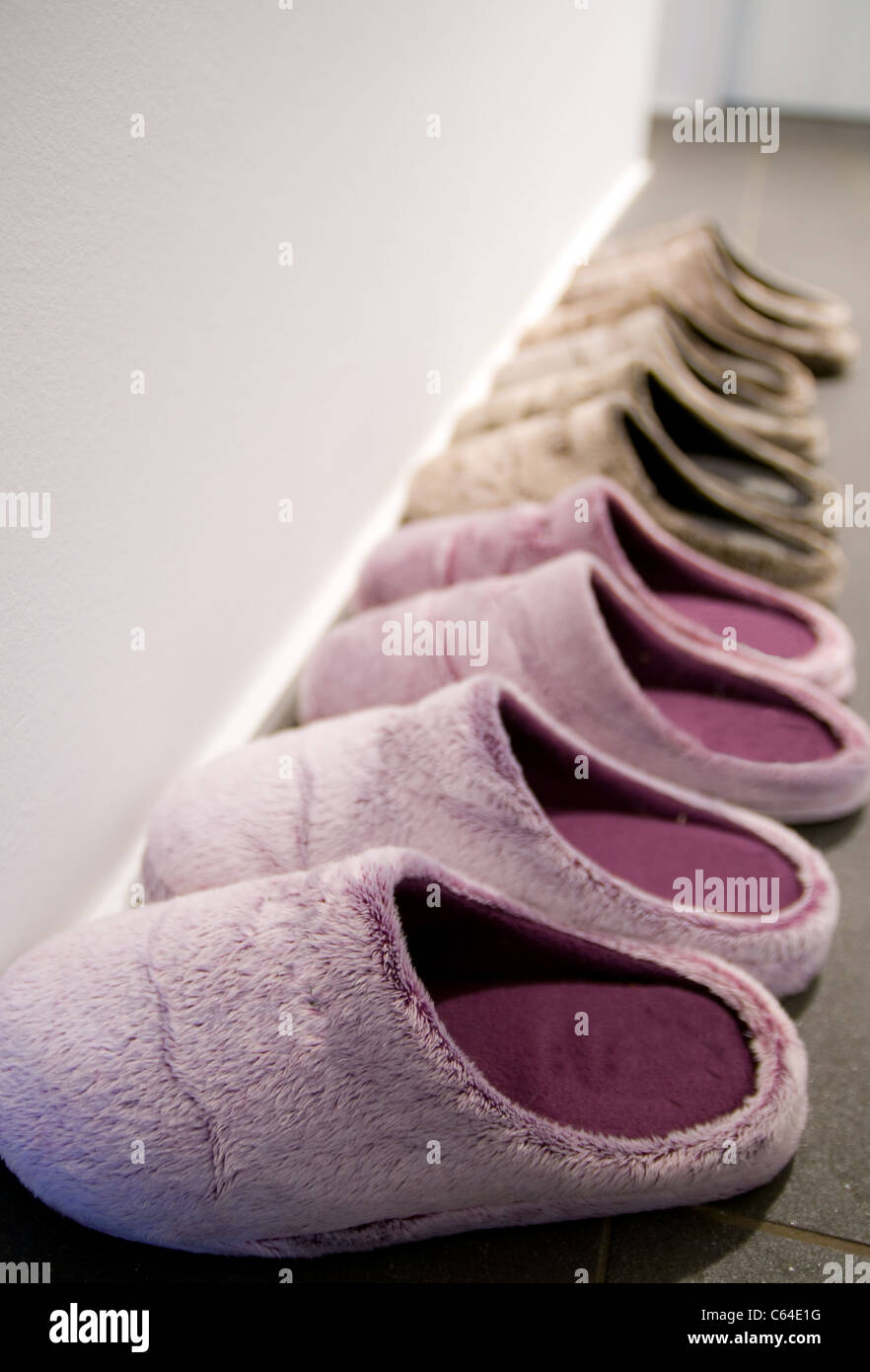 many slippers in a row Stock Photo - Alamy