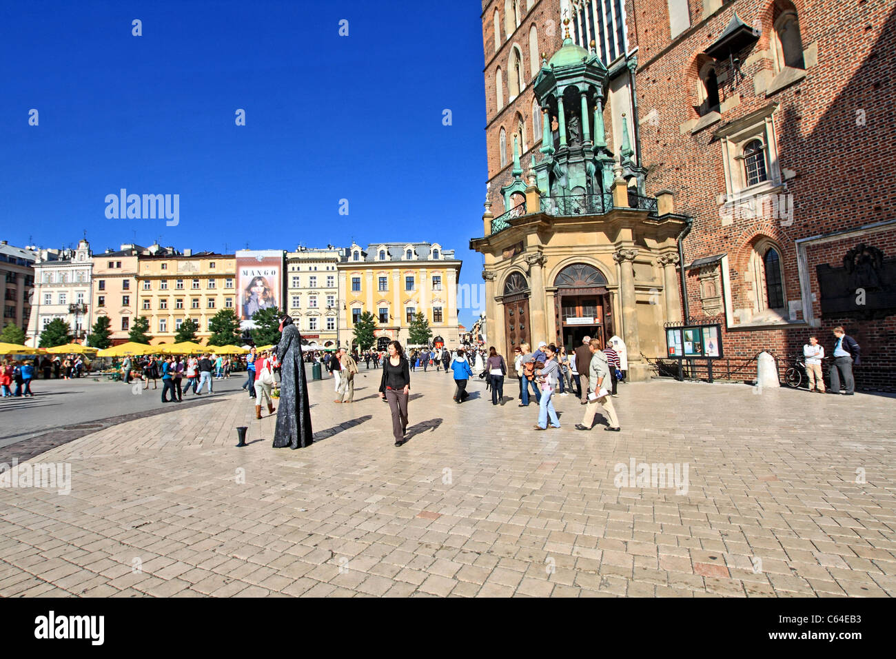 Main Square Market, and Mariacki Church, Cracow, Poland Stock Photo - Alamy