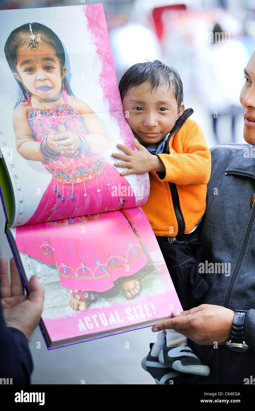Khagendra Thapa Mager, the shortest teenager in the world, poses for ...