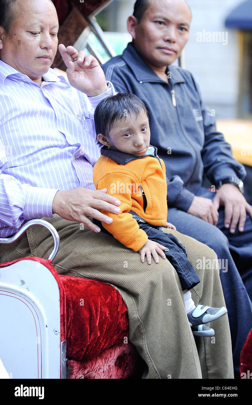 Khagendra Thapa Mager, the shortest teenager in the world, poses for ...