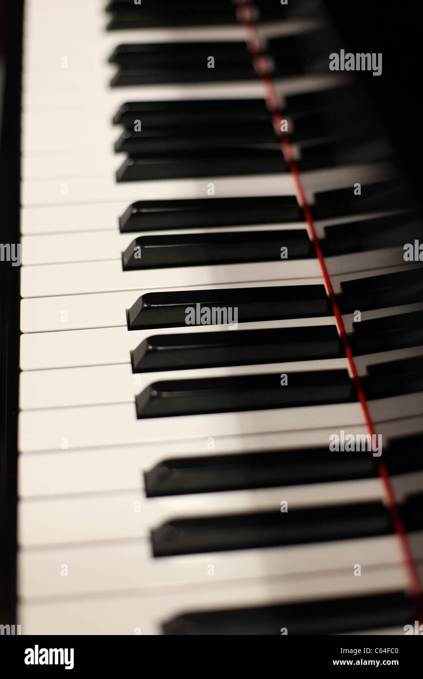 row of black and white piano keys Stock Photo - Alamy