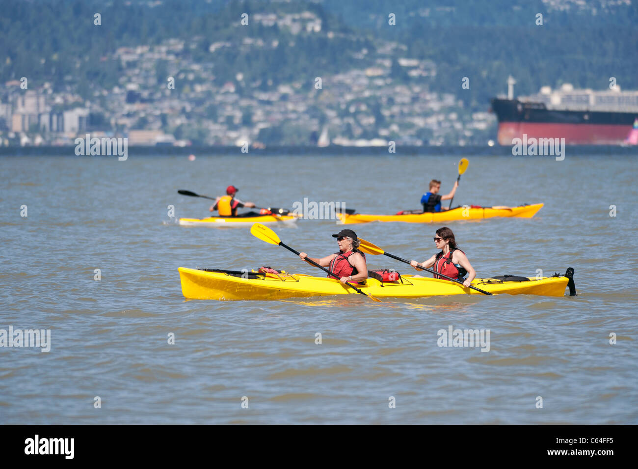 Two women paddling not men hi-res stock photography and images - Alamy