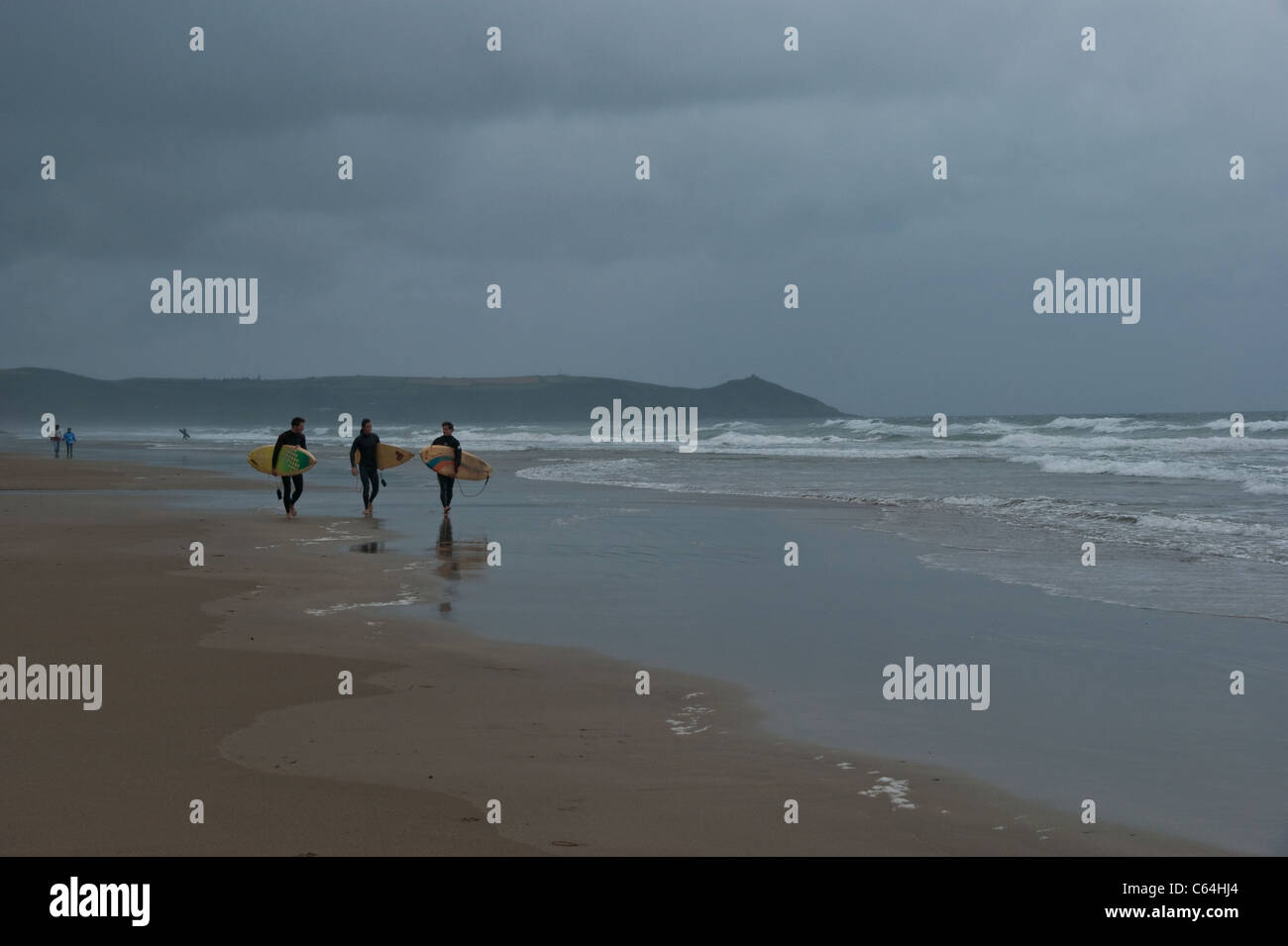 Whitsand Bay, Cornwall on a cloudy windy day - with surfers in the ...