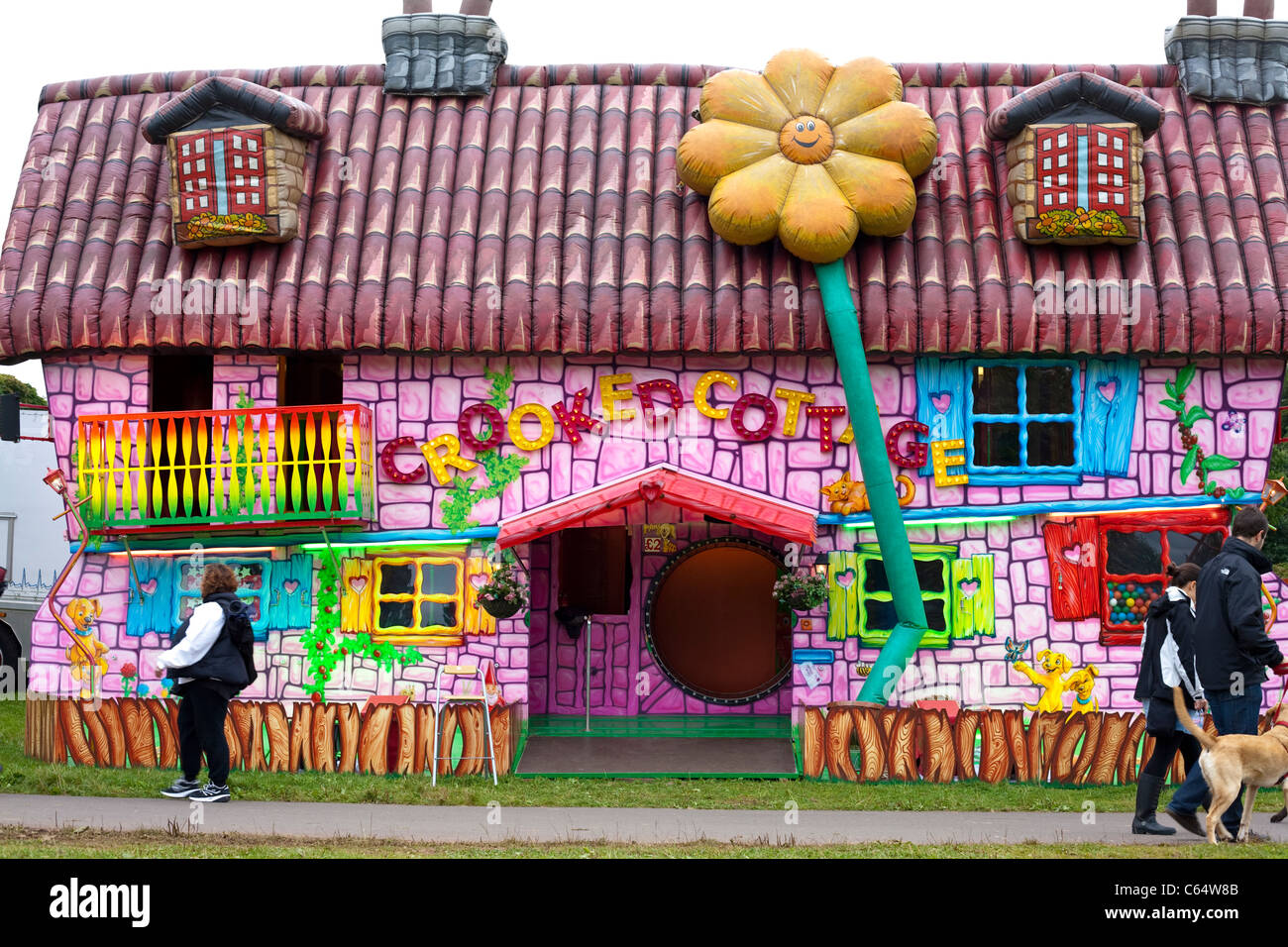 crooked cottage at the bristol balloon fiesta fairground Stock Photo ...