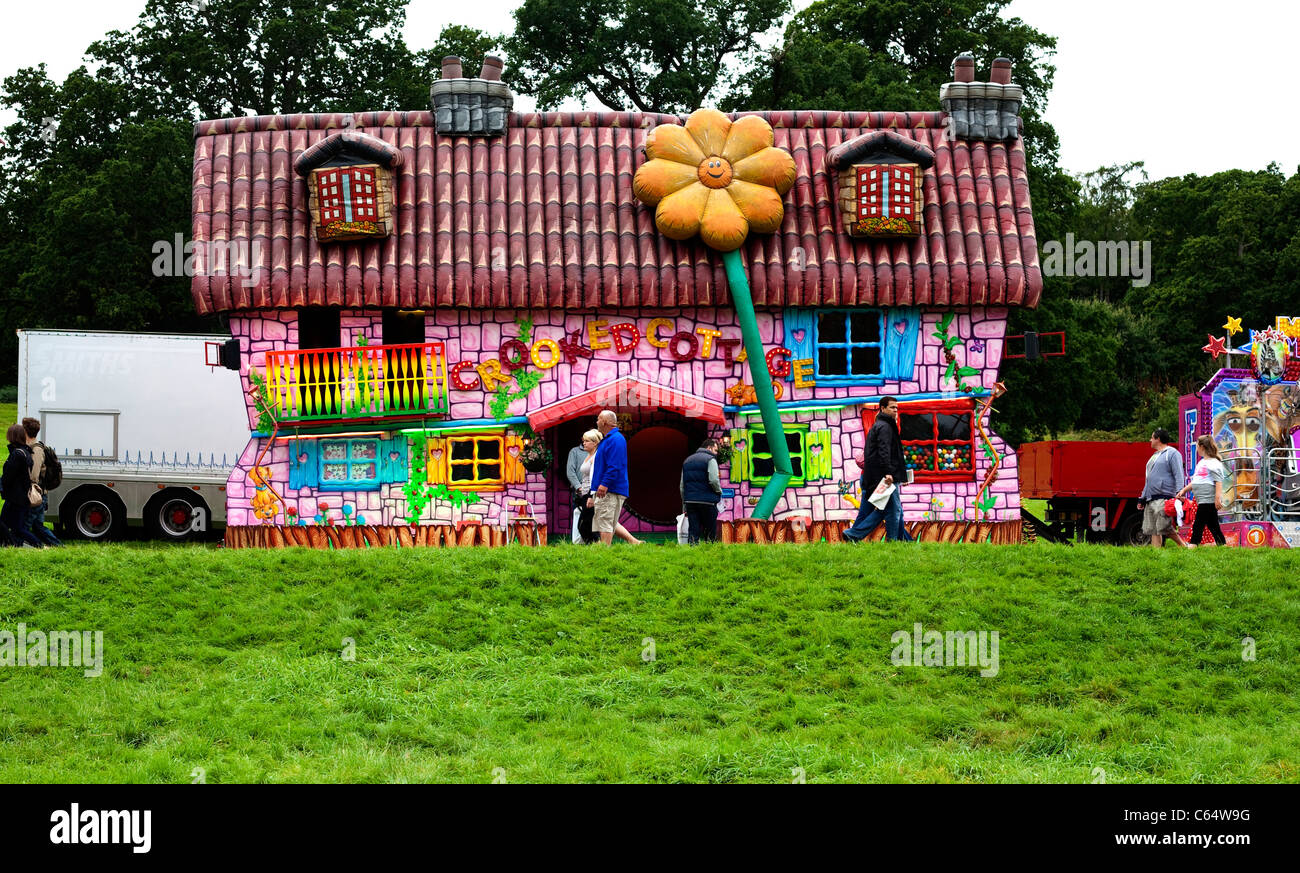 crooked cottage at the bristol balloon fiesta fairground Stock Photo ...