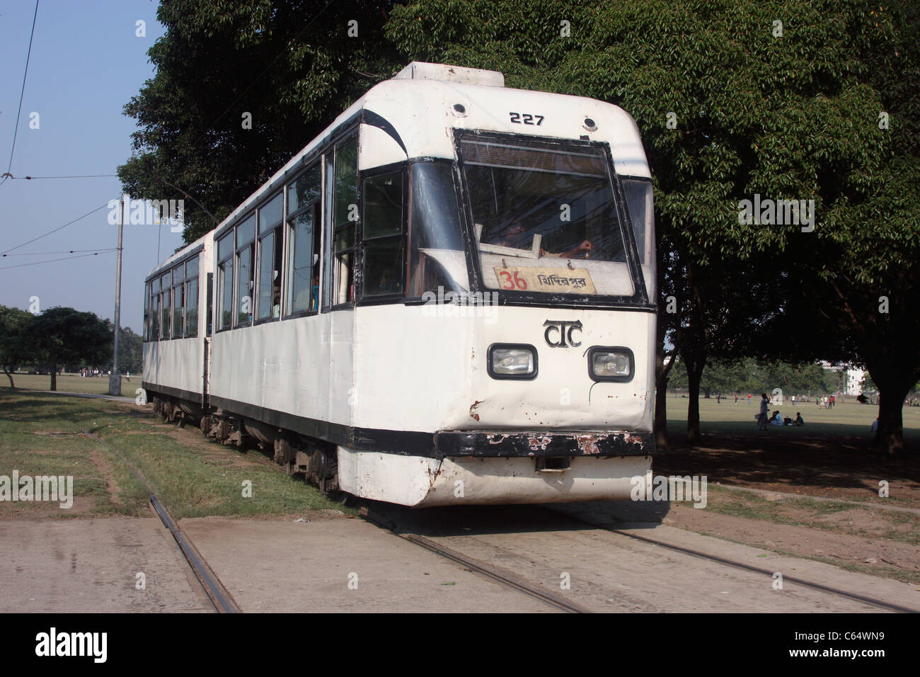 Modern type tram of CTC speeds through Victoria Park Kolkata India ...