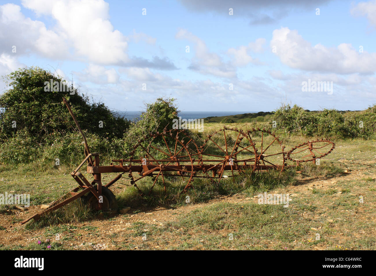 Old discarded farm machinery Stock Photo - Alamy