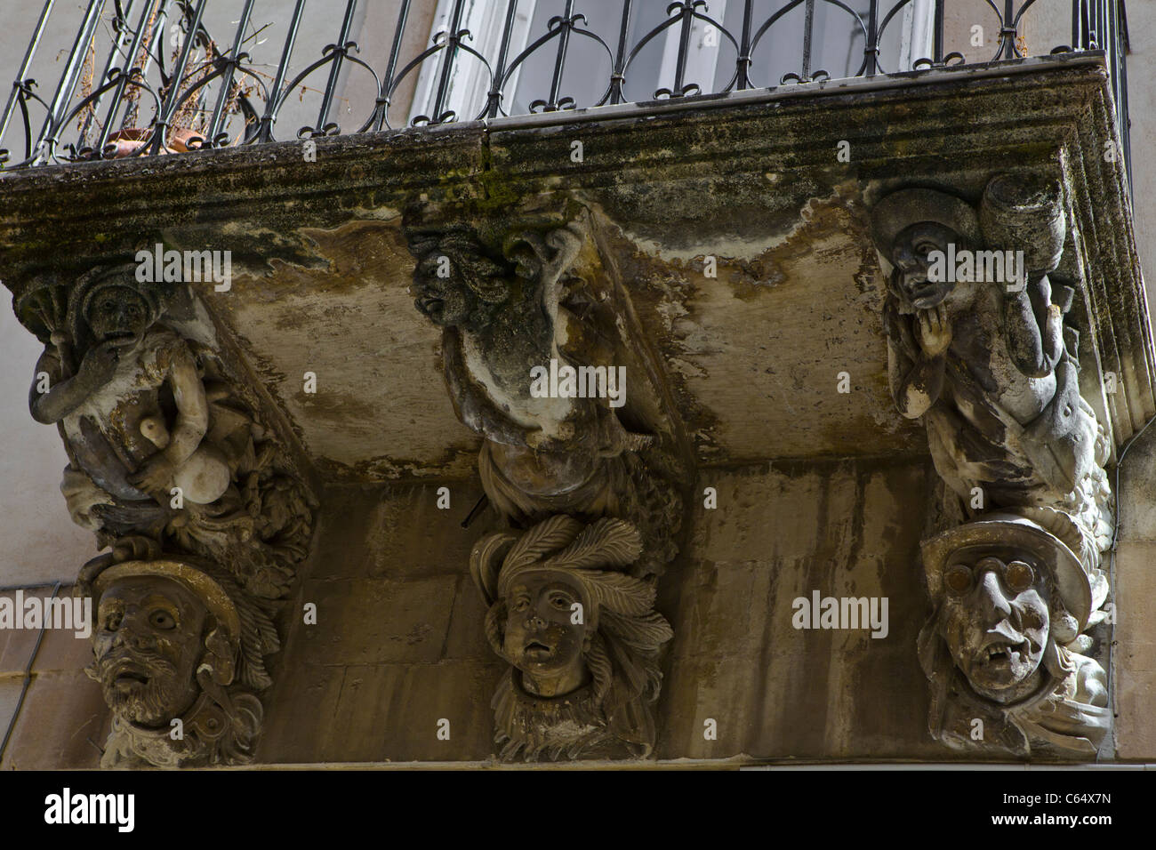 Details of a baroque balcony - Ornaments and Sculptures in a Sicilian ...