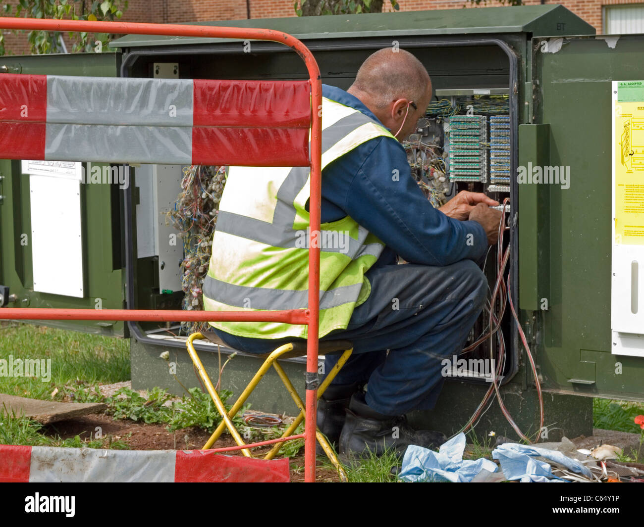 telephone engineer working at junction box Stock Photo - Alamy