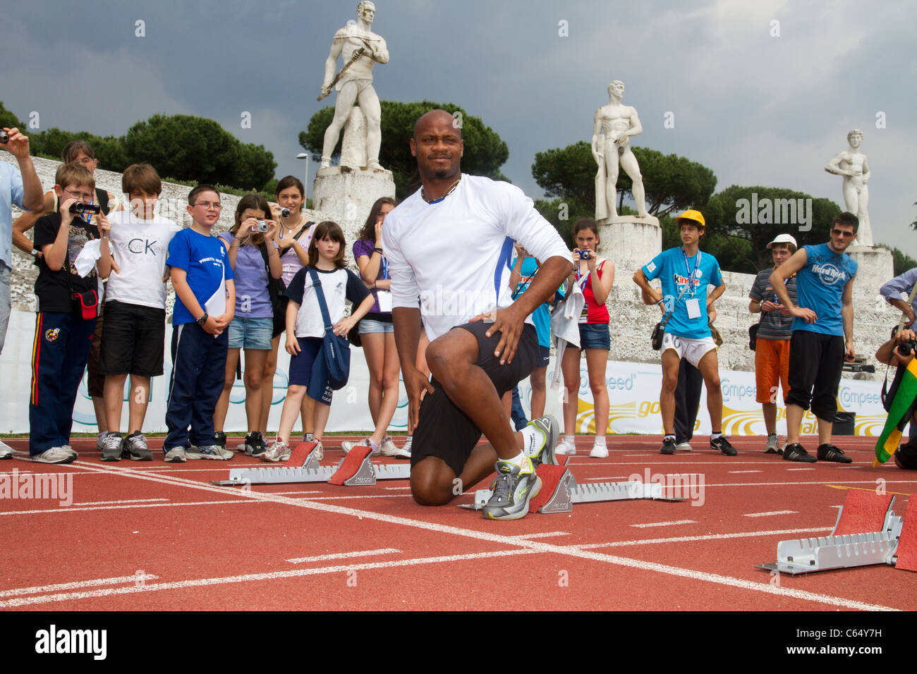 Asafa Powell athlete sprinter 100m teaching to a group of young ...