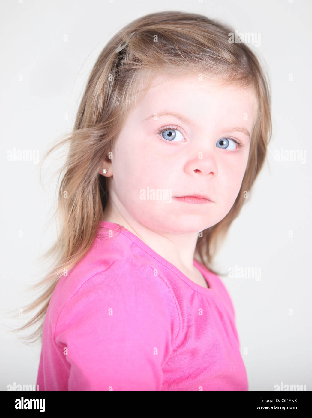 Pretty toddler girl with attitude on white background Stock Photo - Alamy