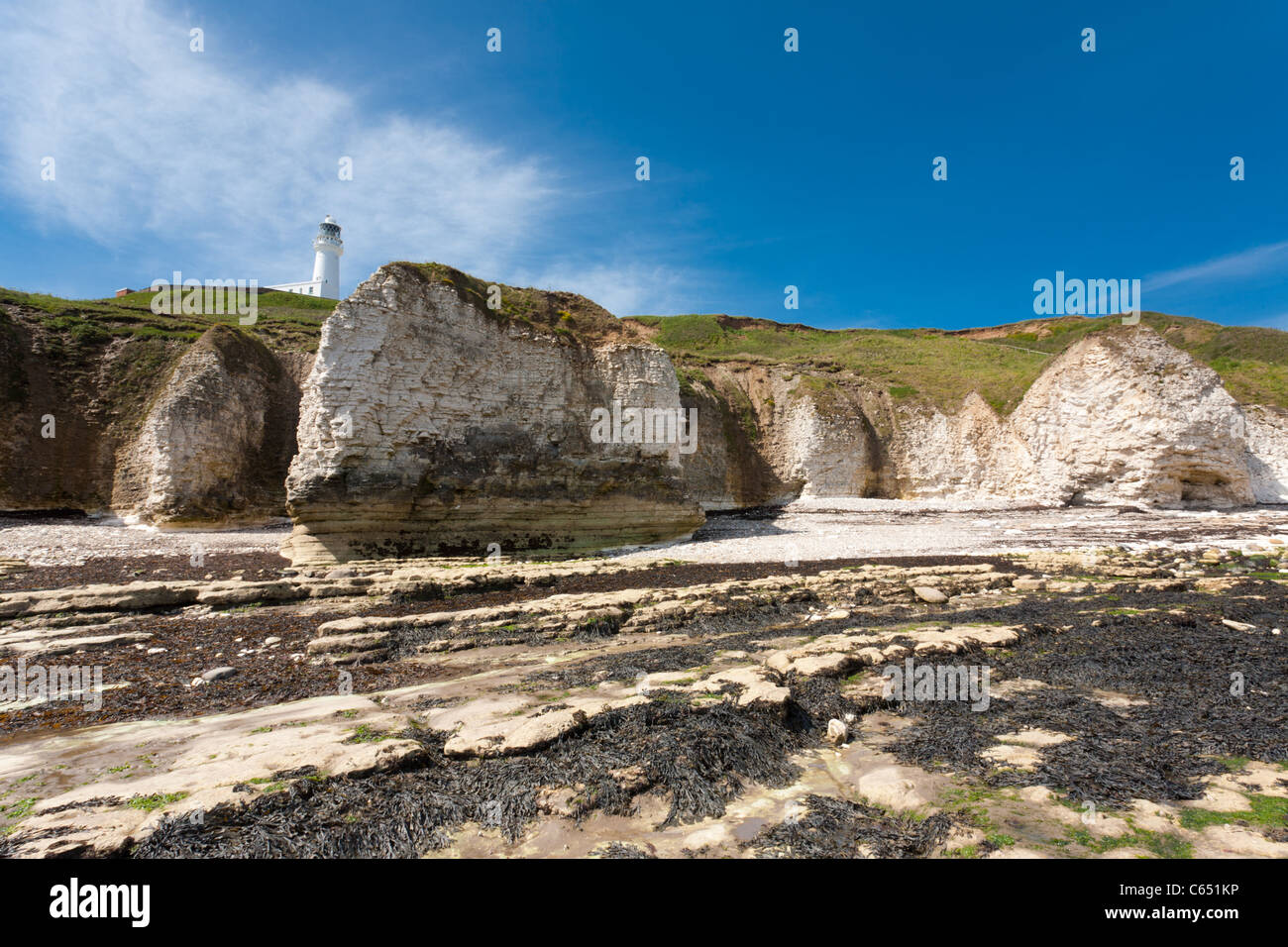 Flamborough Head Lighthouse from the beach at Low Tide in Flamborough ...