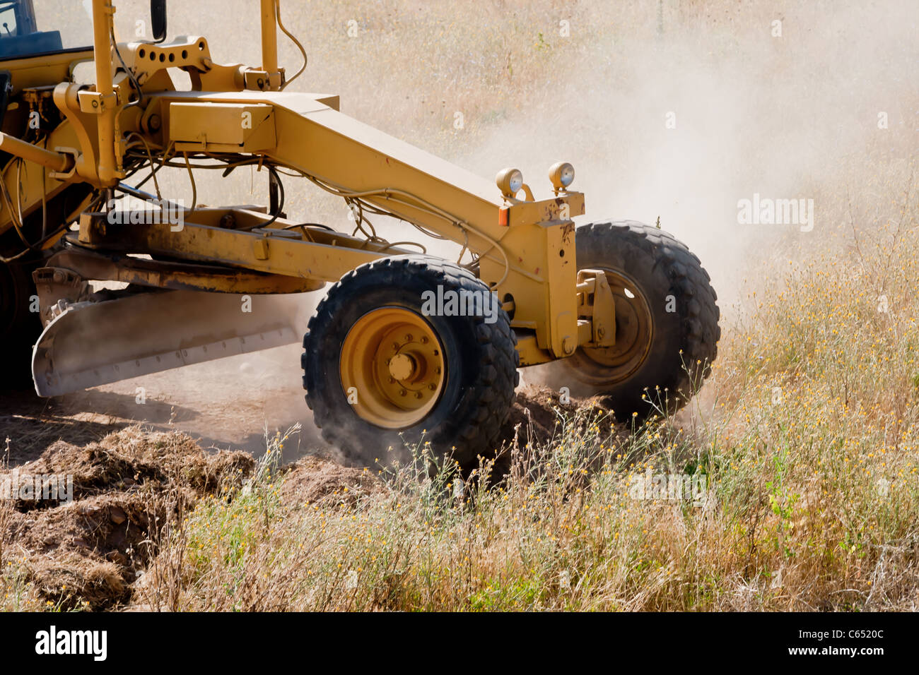 grader cleaning the road Stock Photo - Alamy