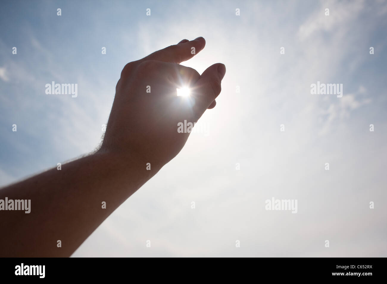 Hand sunbeam hi-res stock photography and images - Alamy