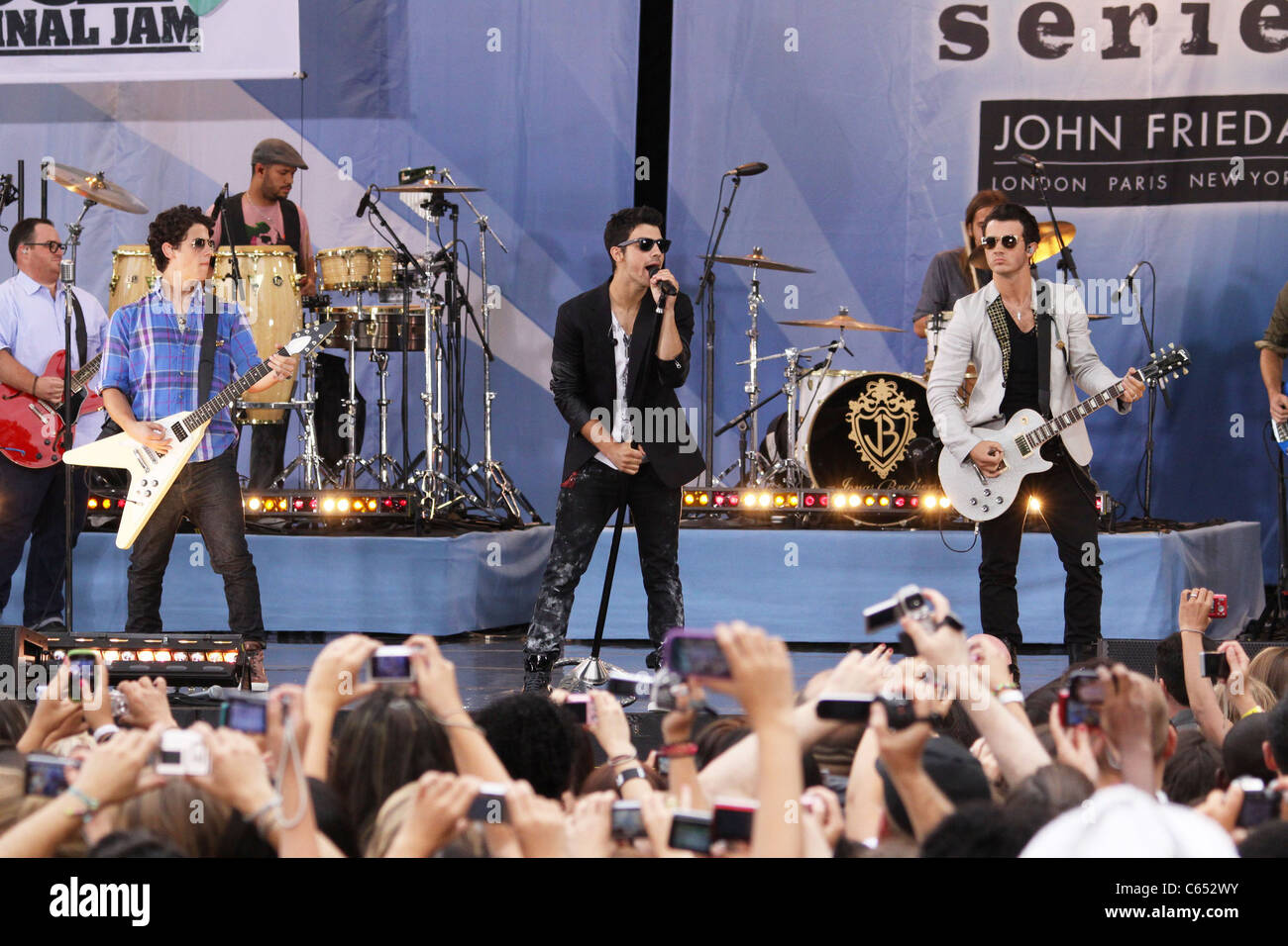Nick Jonas, Joe Jonas, Kevin Jonas, (The Jonas Brothers) on stage for ...