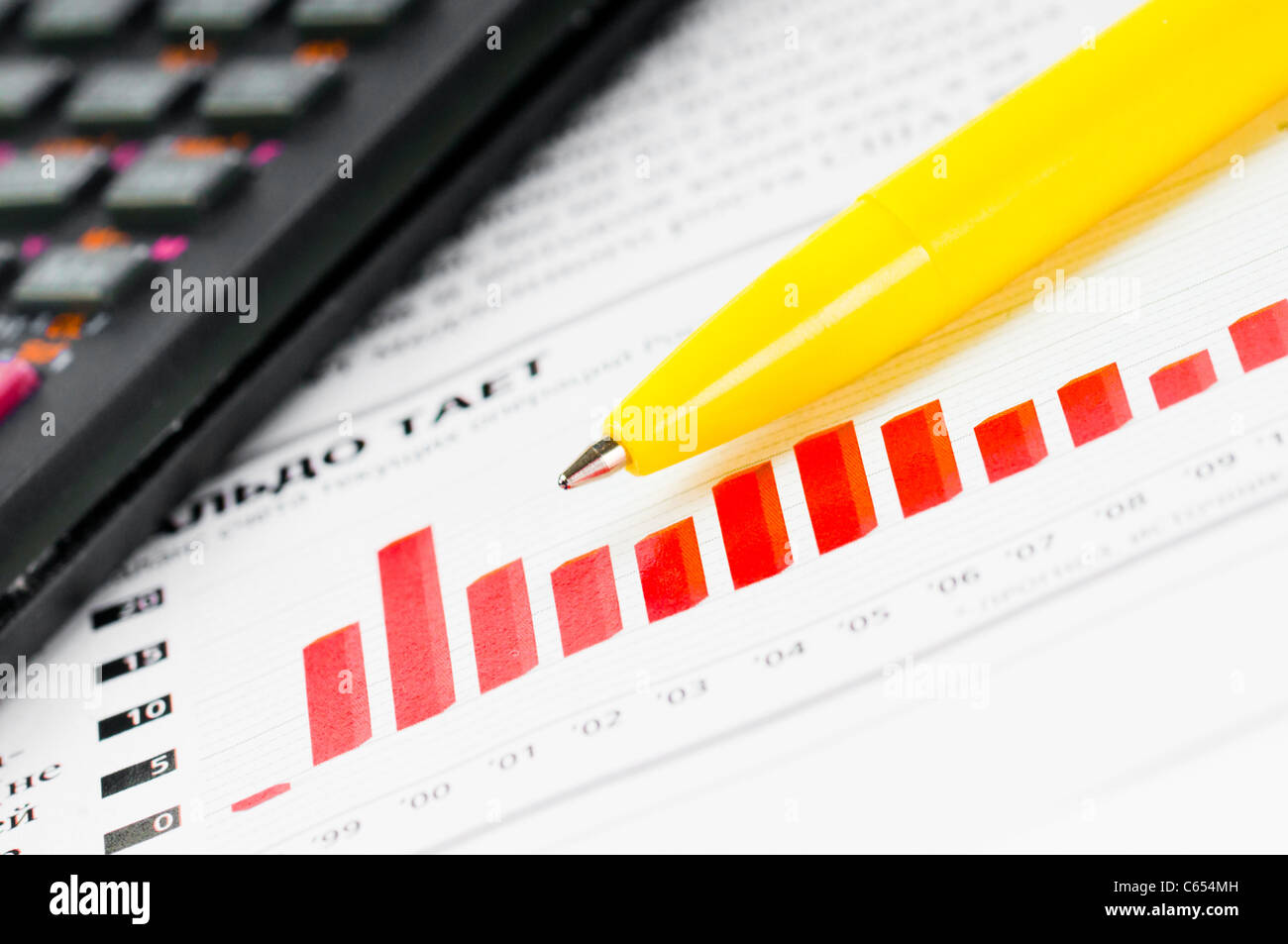 Business concept: calculator, pen and diagram Stock Photo - Alamy