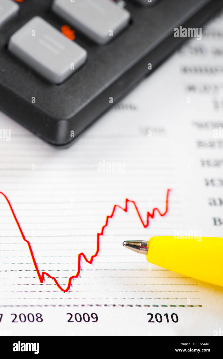 Business concept: calculator, pen and diagram Stock Photo - Alamy