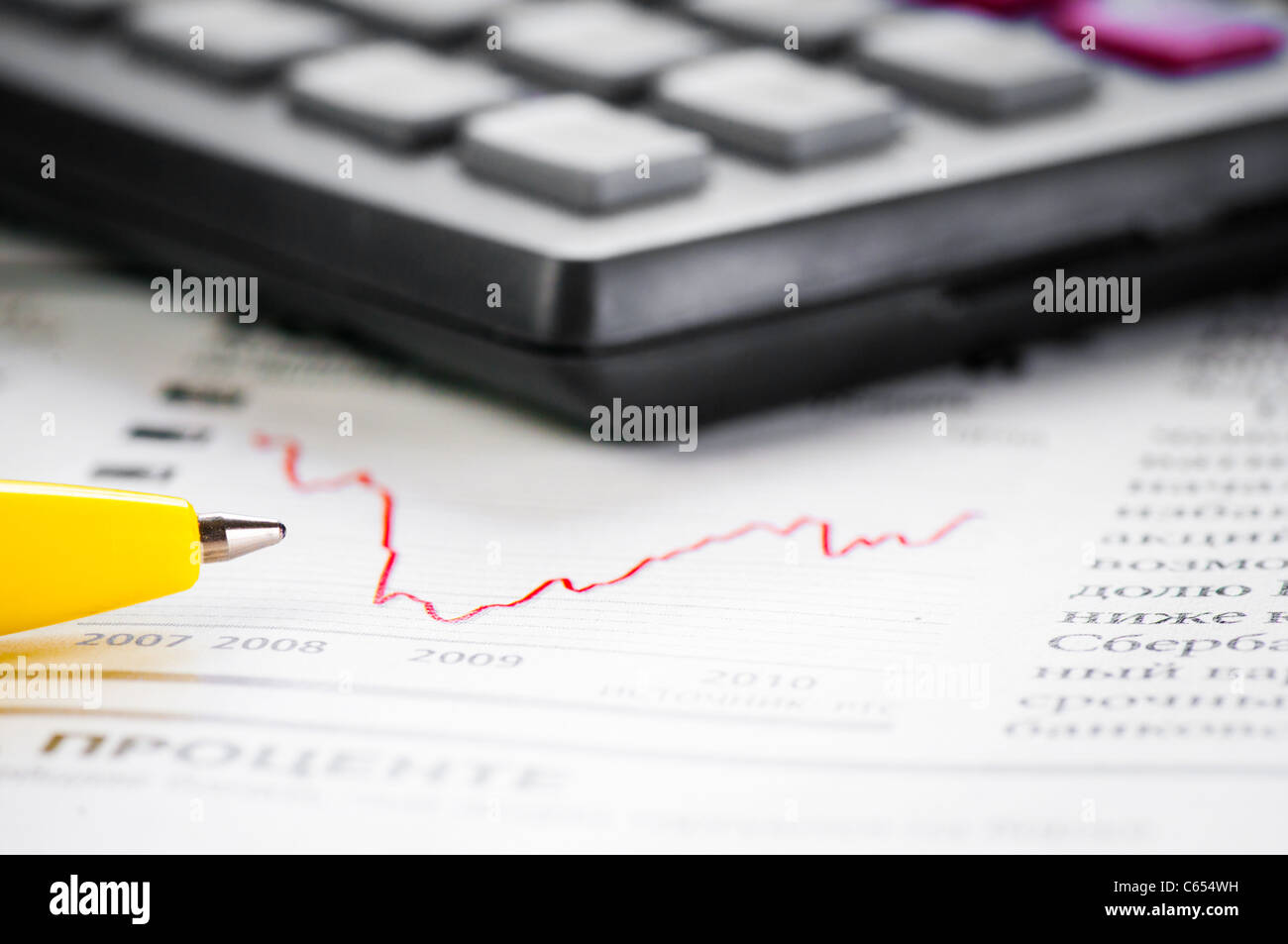 Business concept: calculator, pen and diagram Stock Photo - Alamy