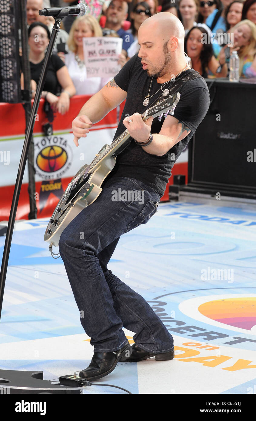 Singing performing on stage playing guitar full length hi-res stock ...