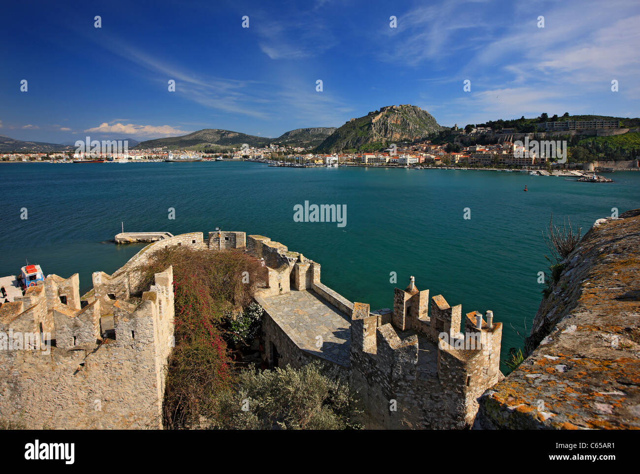Inside view of Bourtzi castle upon a tiny island, with Nafplio town and ...