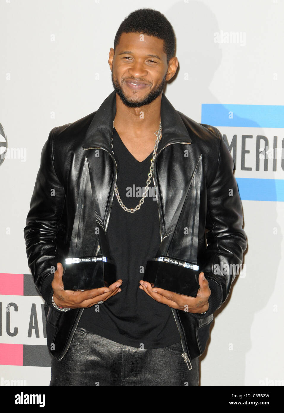 Usher in the press room for The 37th Annual American Music Awards (2010 ...