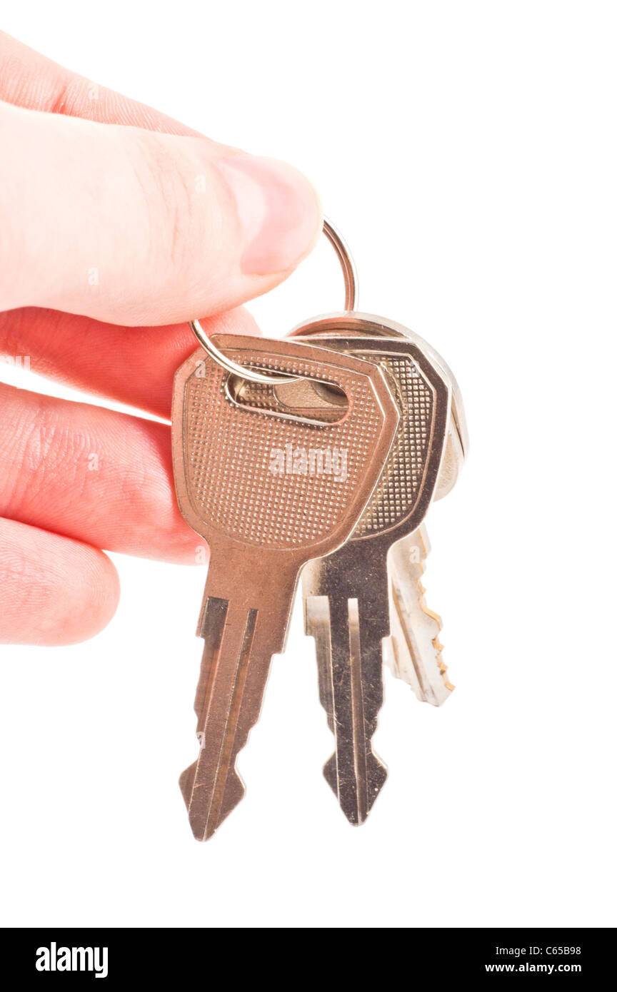 human hand with keys on white Stock Photo - Alamy