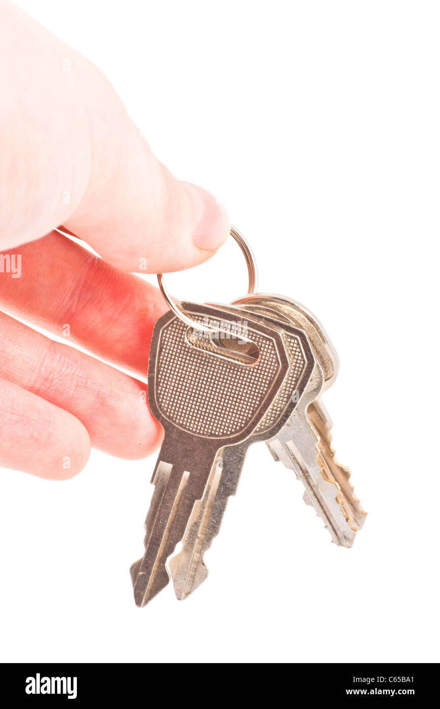 human hand with keys on white Stock Photo - Alamy