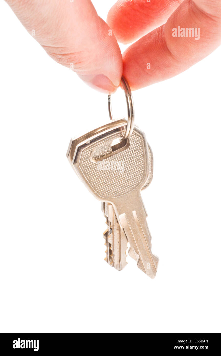 human hand with keys on white Stock Photo - Alamy