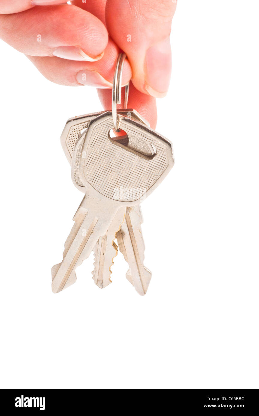 human hand with keys on white Stock Photo - Alamy