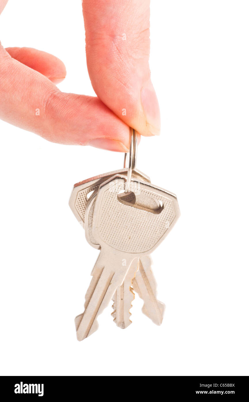 human hand with keys on white Stock Photo - Alamy