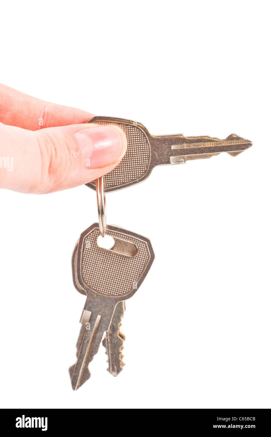 human hand with keys on white Stock Photo - Alamy