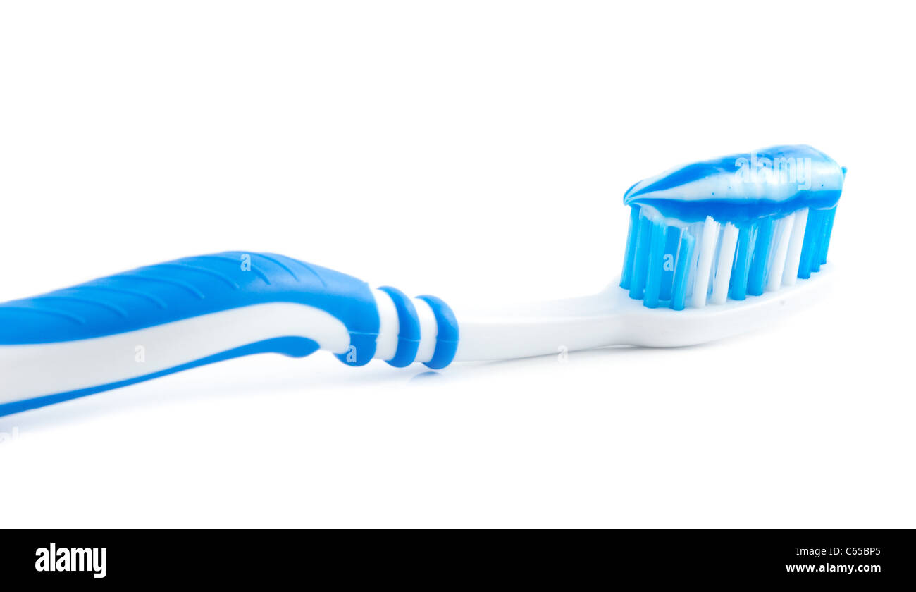 Dental brush and with paste isolated on white Stock Photo - Alamy