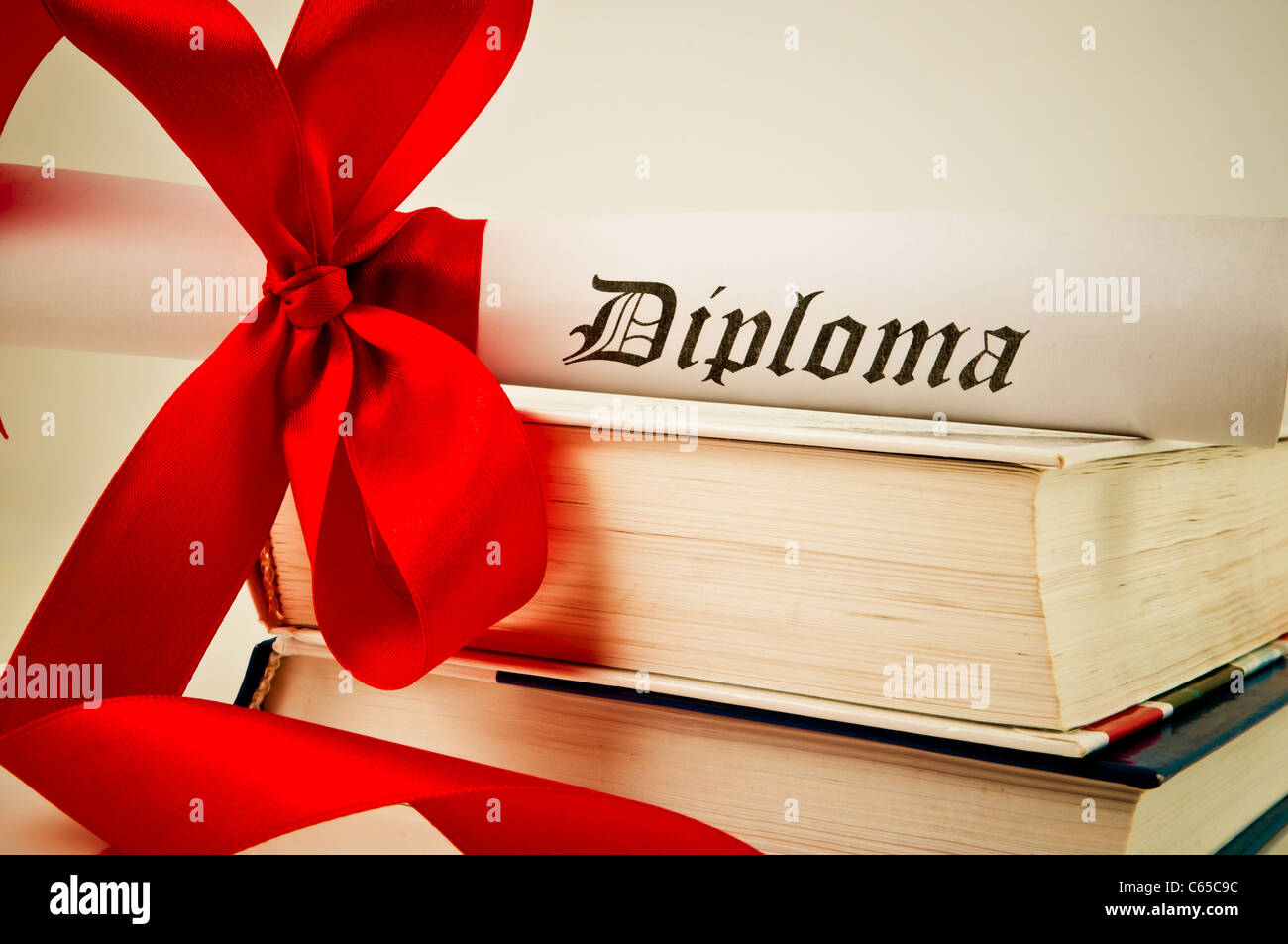 University degree scroll hi-res stock photography and images - Alamy