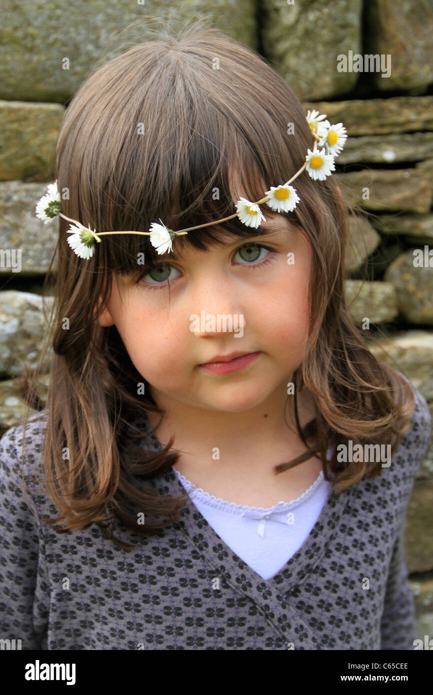 Girl with daisy chain Stock Photo - Alamy