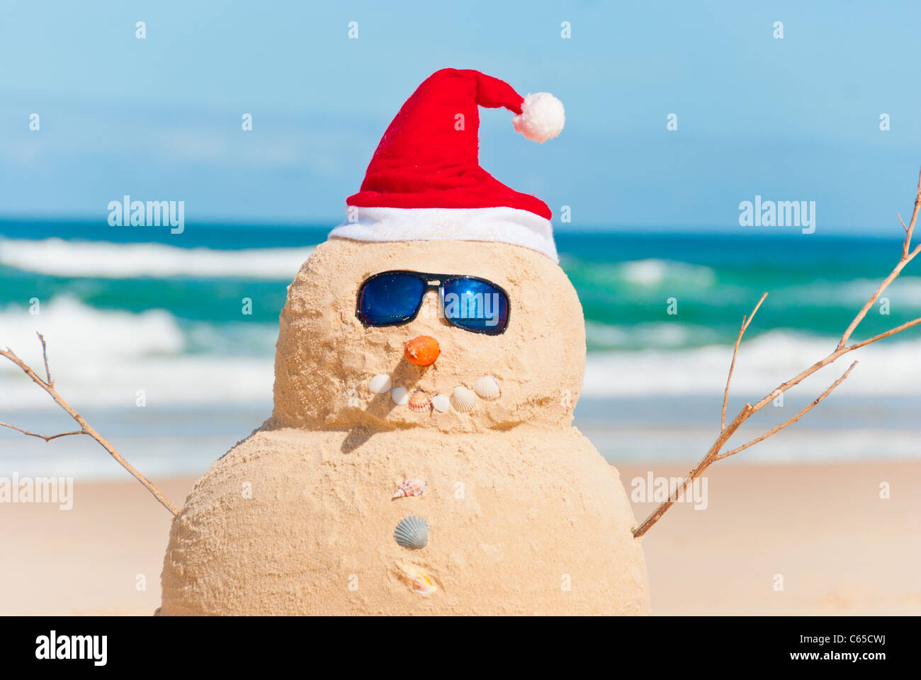 Snowman made sand on beach hi-res stock photography and images - Alamy