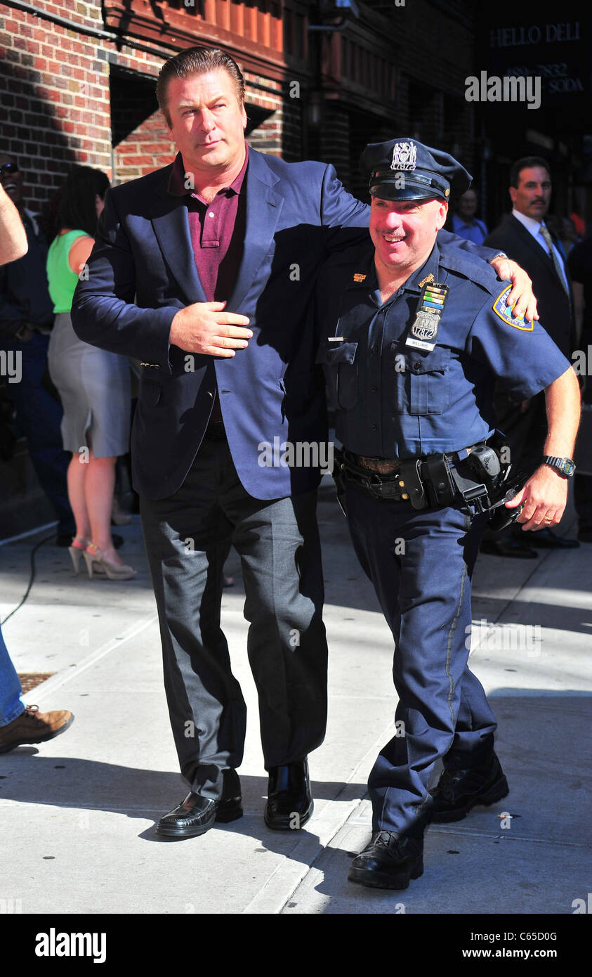Alec Baldwin, NY Police Officer at talk show appearance for The Late ...