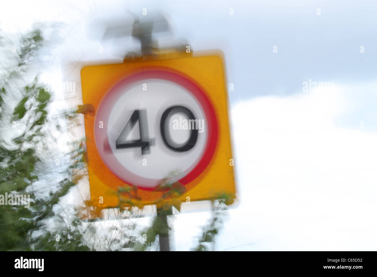 A 40 mph British speed limit sign showing movement to indicate excess ... A 40 mph British speed limit sign showing movement to indicate excess ...