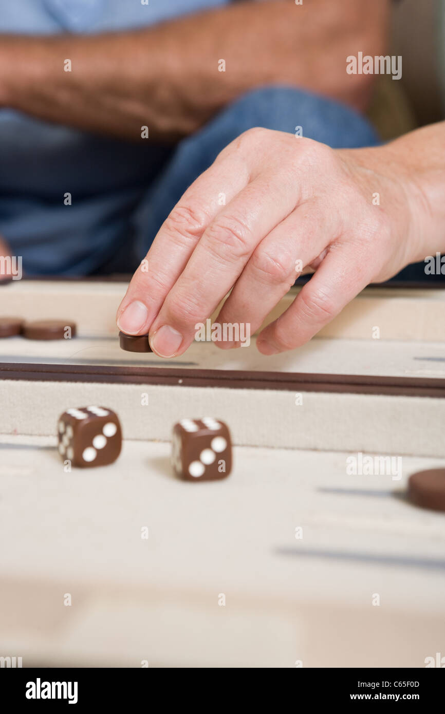 People playing backgammon Stock Photo - Alamy