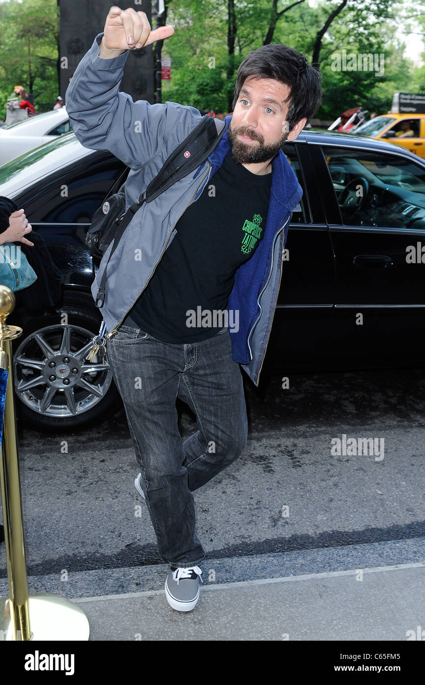 Joshua Gomez, enters a Midtown Manhattan hotel out and about for ...