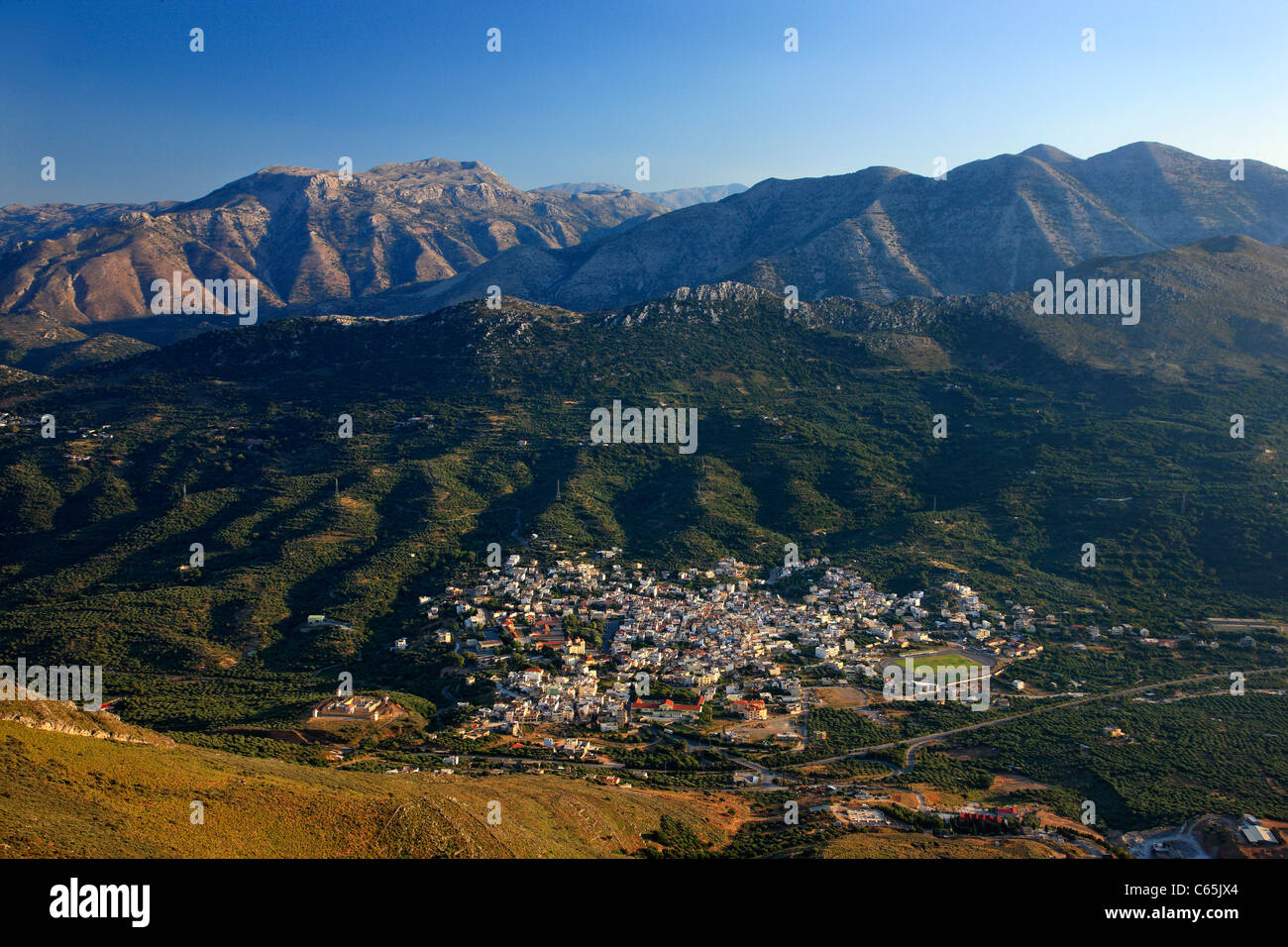 Panoramic view of Neapolis town. In the background the mountains of ...