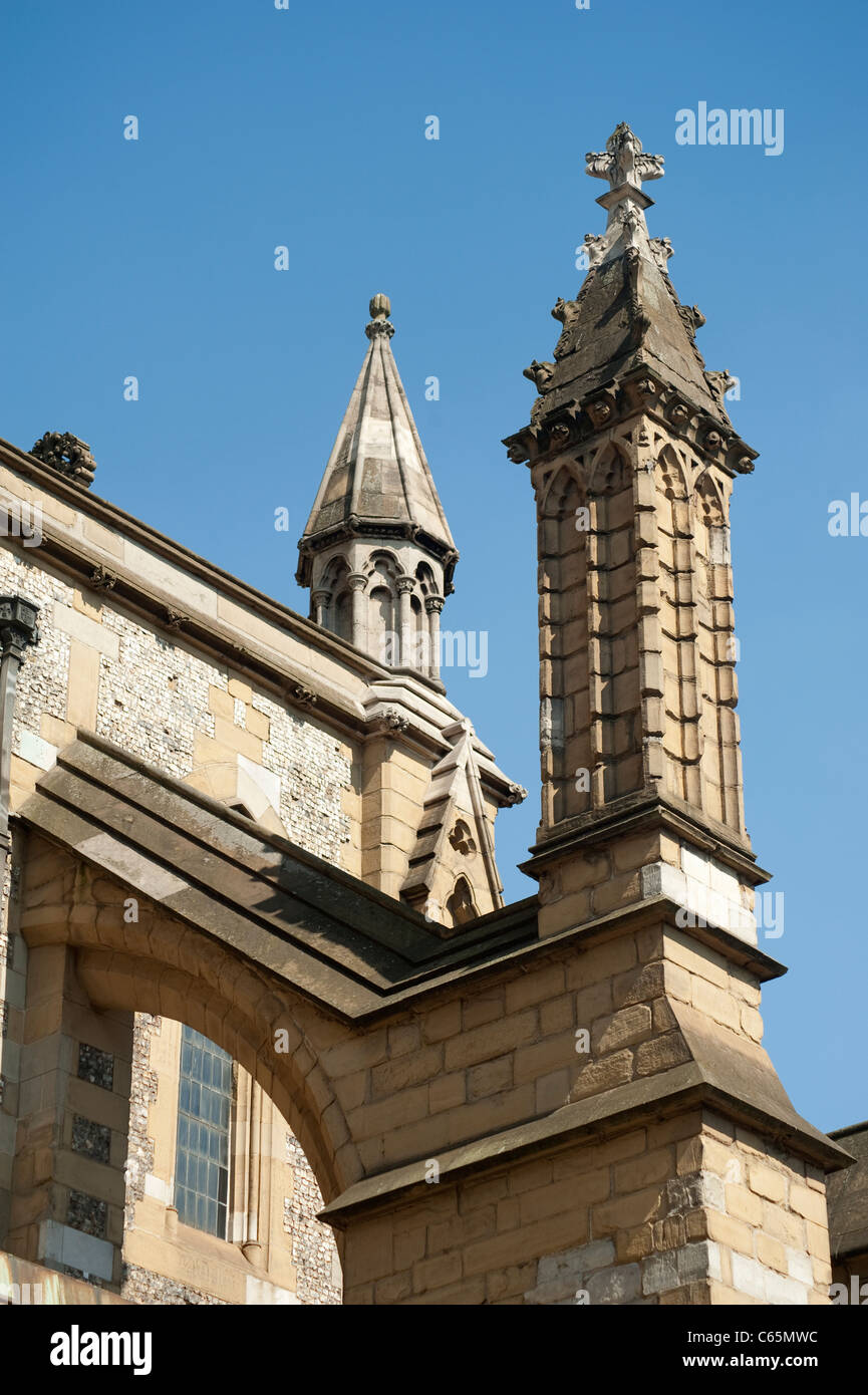 Church spires with blue sky in background Stock Photo - Alamy