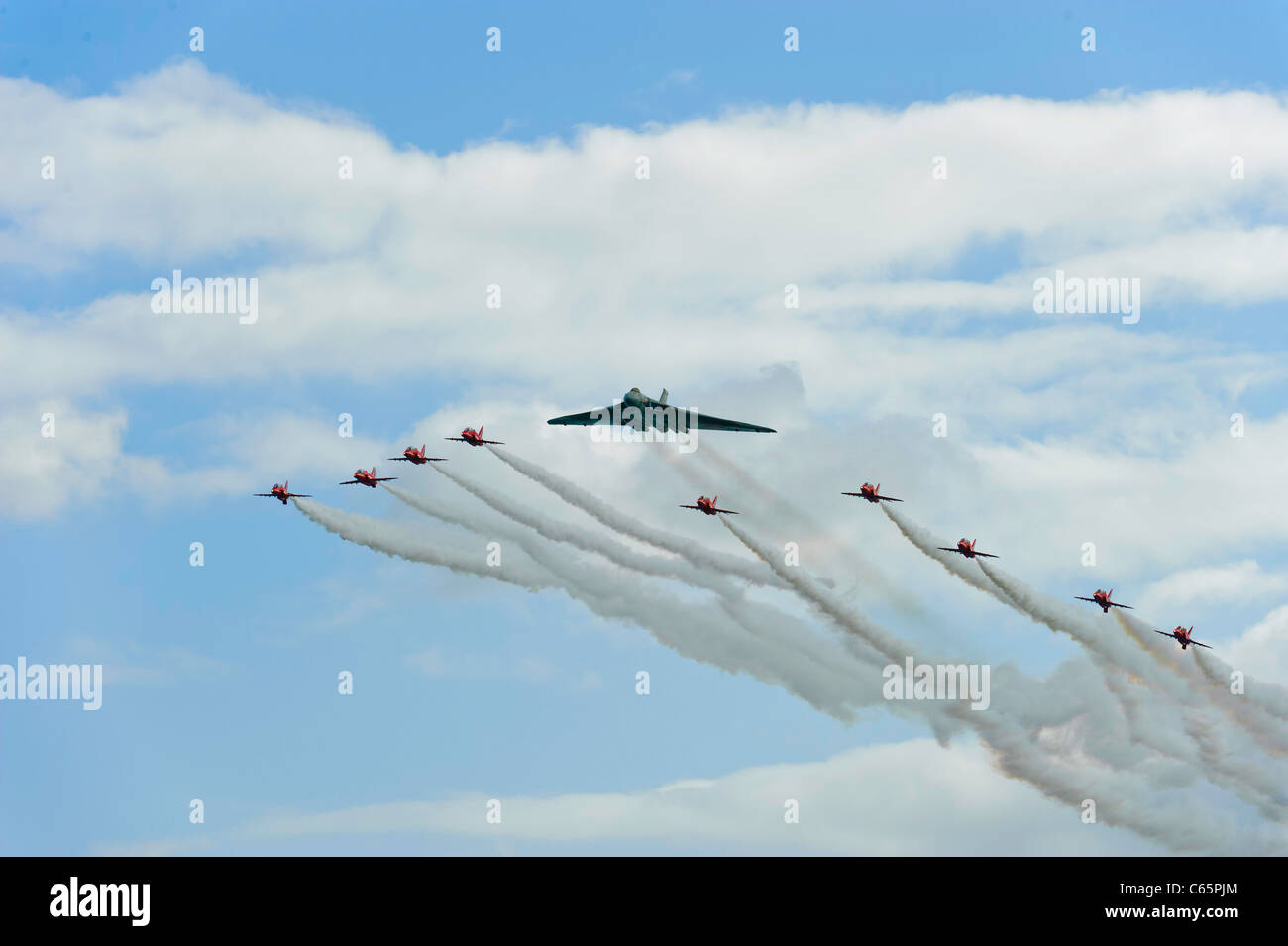Vulcan bomber with red arrows hi-res stock photography and images - Alamy
