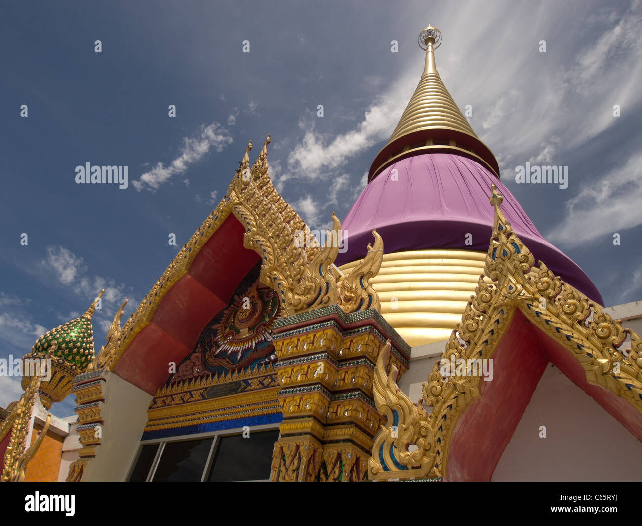 Ornate Thai Temple with a decorated Chedi Stock Photo - Alamy