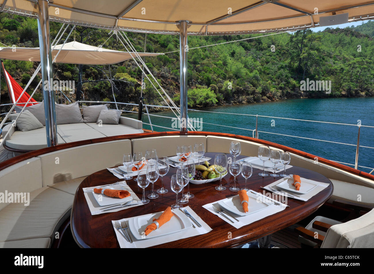 dinner table the deck of luxury sailboat Stock Photo - Alamy