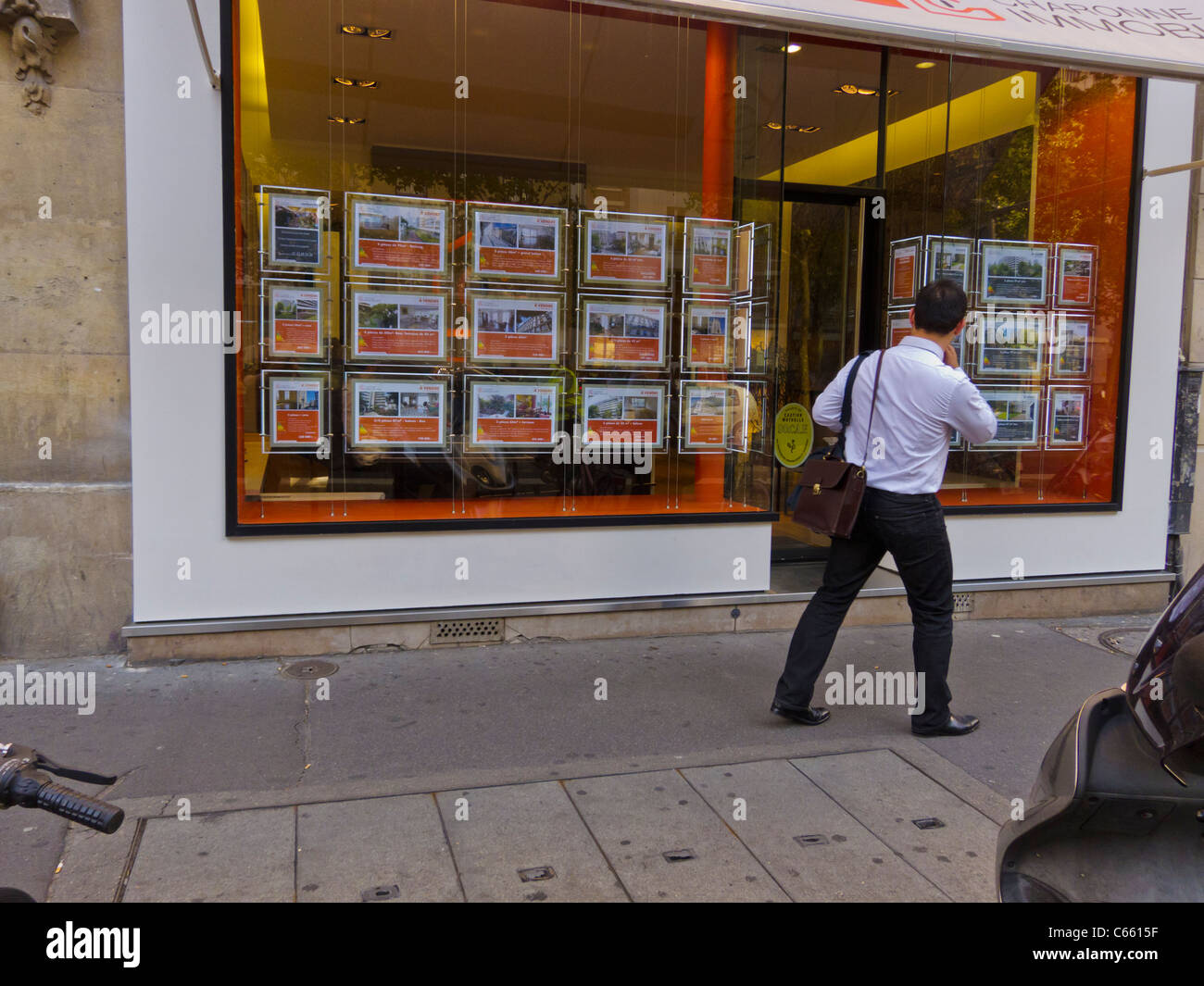 Paris, France, Man Walking Shop Front, Window Shopping at Real Estate ...
