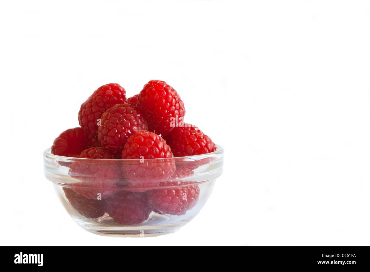 fresh ripe raspberries in a glass dish Stock Photo - Alamy